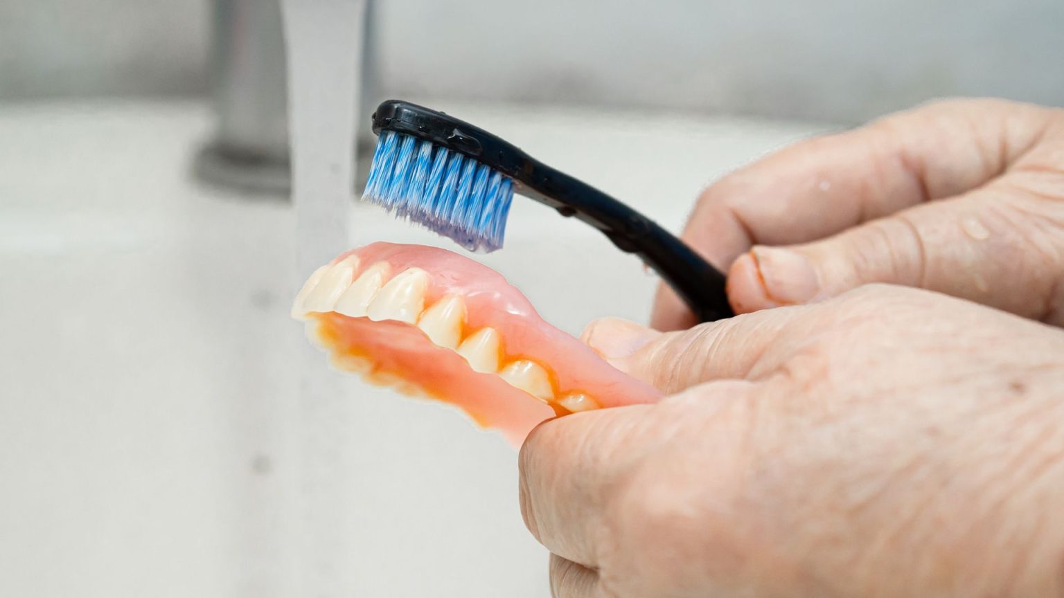 How to Clean Dentures? - Olds Denture & Implant Centre